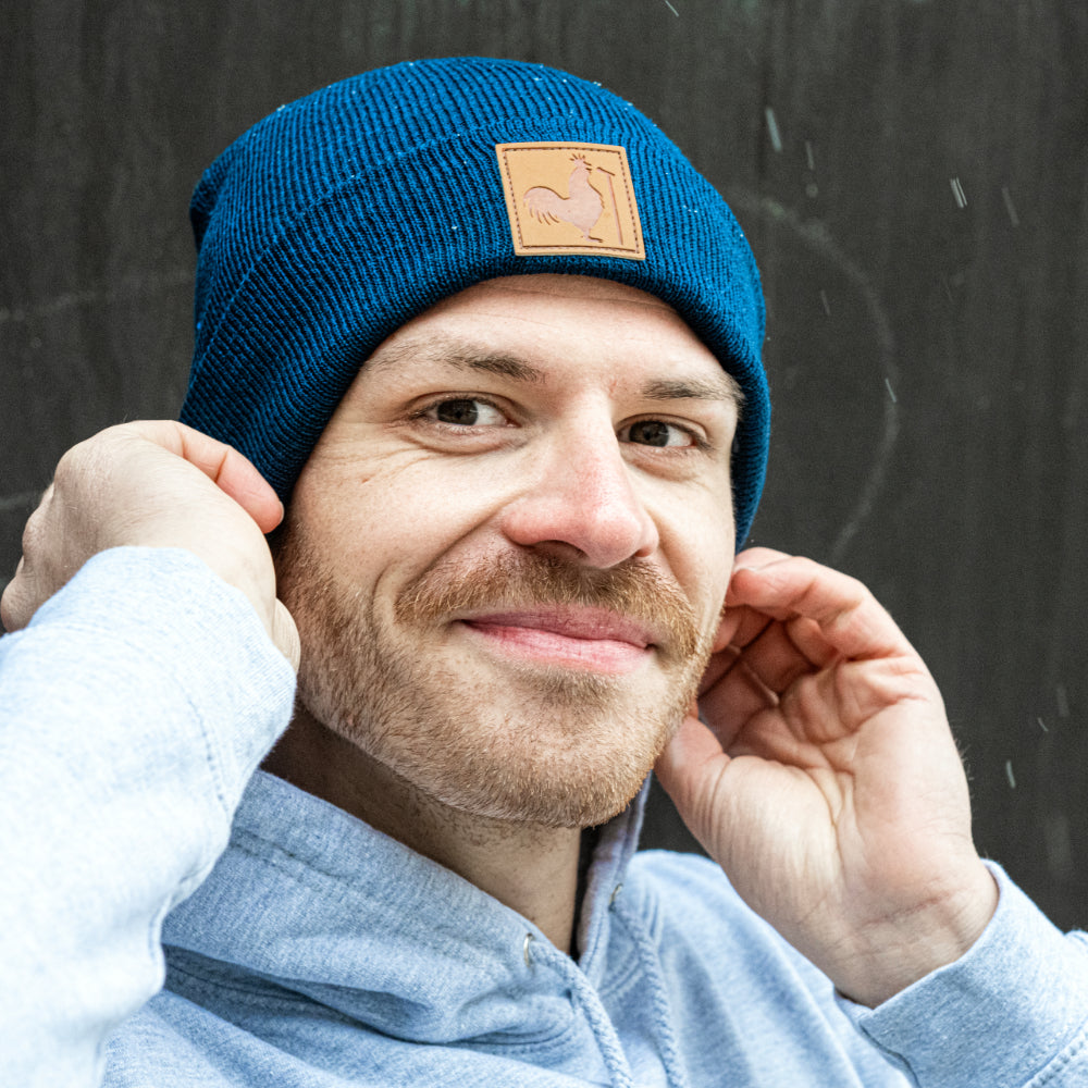 Strickmütze mit "Gockel-Patch" – Martin Frank Merchandise